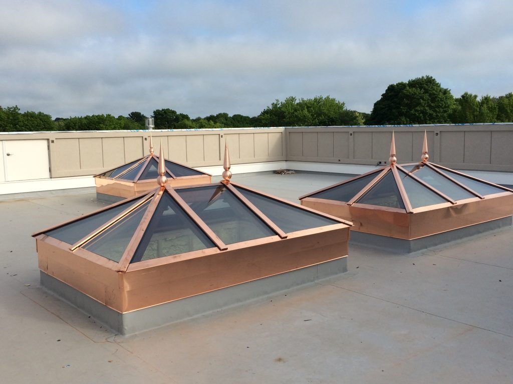 Custom wood hip and pyramid skylights | Glass House, LLC